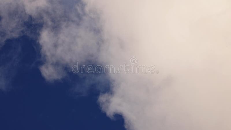 White Cloud Moves Quickly and Changes Shape Against the Blue Sky. Cloud ...
