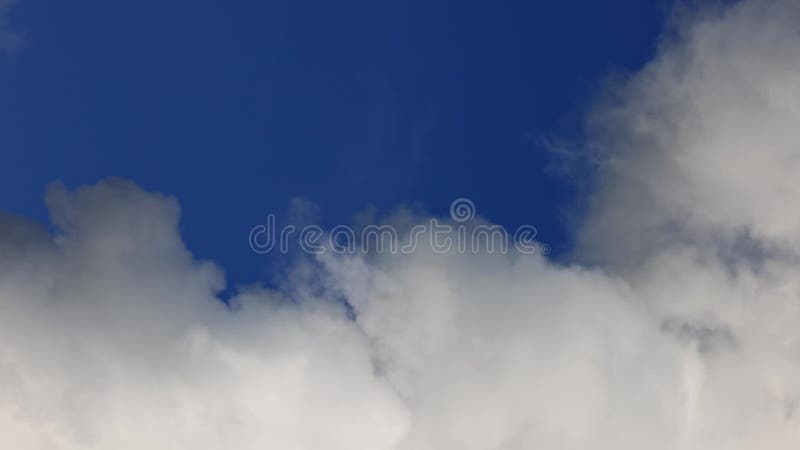 White Cloud Moves Quickly and Changes Shape Against the Blue Sky. Cloud ...
