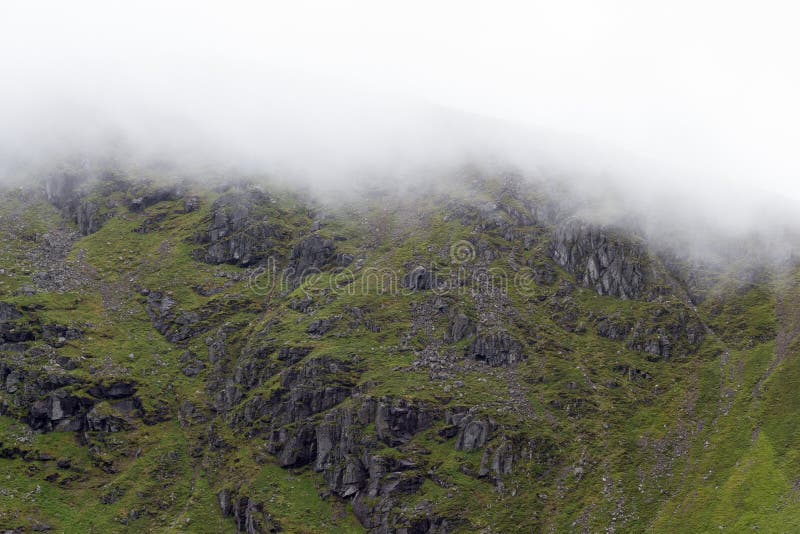 White Cloud Rolling Down Over Rocky Scottish Hillside Stock Image ...