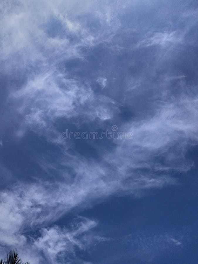 Strange Alien Head Shape Clouds Visible in the Sunny Daylight Stock ...