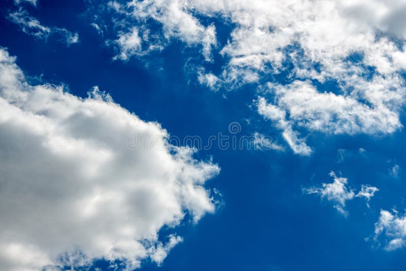 White Clouds on a Blue Background. Horizontal Photography Stock Image ...