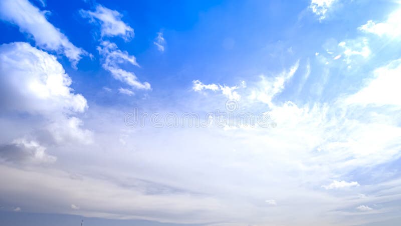 White Cumulus Clouds Against a Clear Blue Sky: a Close-Up View Stock ...