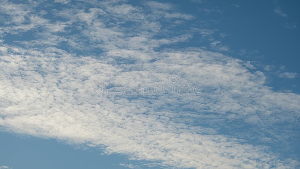 White Clouds on a Blue Sky. Feather Clouds in the Sky, Cloud Background Stock Image - Image of ...