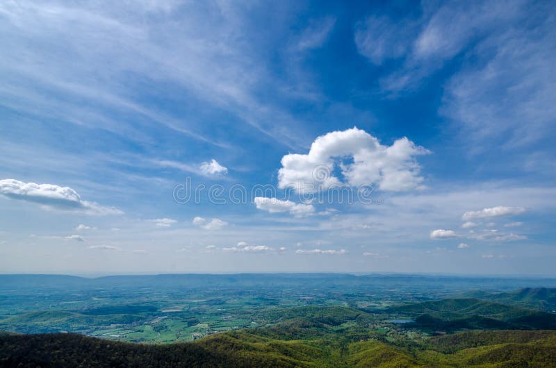 White Clouds in Blue Sky from High Mountain Vantage Point Stock Image ...