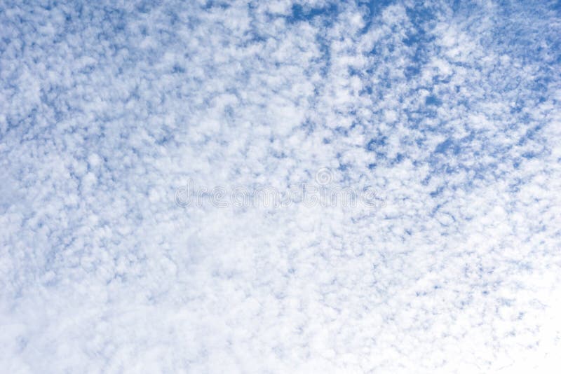 White Clouds on a Blue Sky on a Sunny Day Background Texture Stock ...