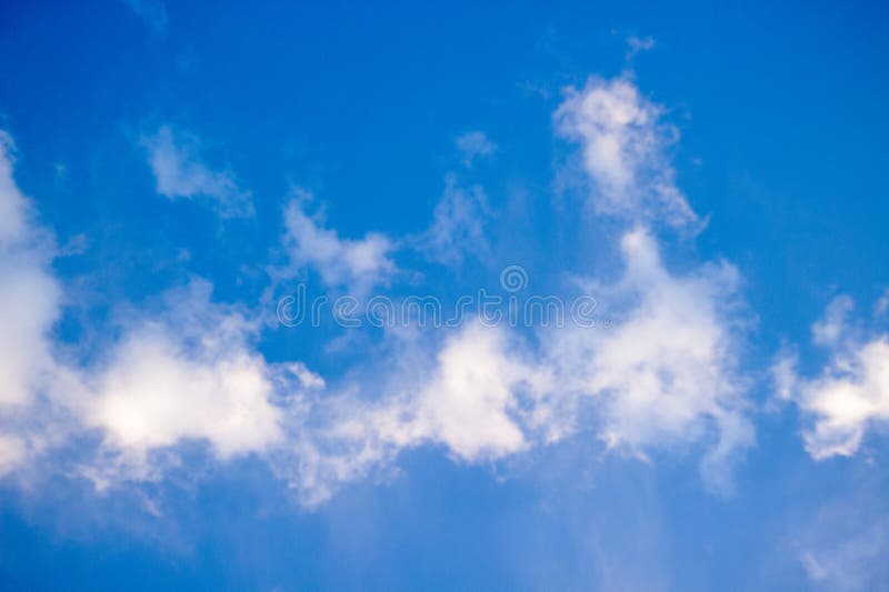 White Clouds Form an Abstract with the Blue Sky Stock Photo - Image of ...