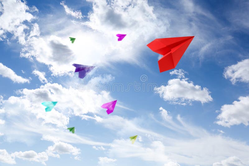 White Clouds and Paper Airplanes Flying in Blue Sky on Sunny Day Stock ...