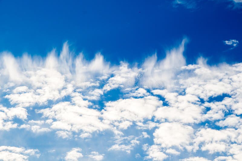 White Clouds are Partly in the Blue Sky Background Stock Photo - Image ...
