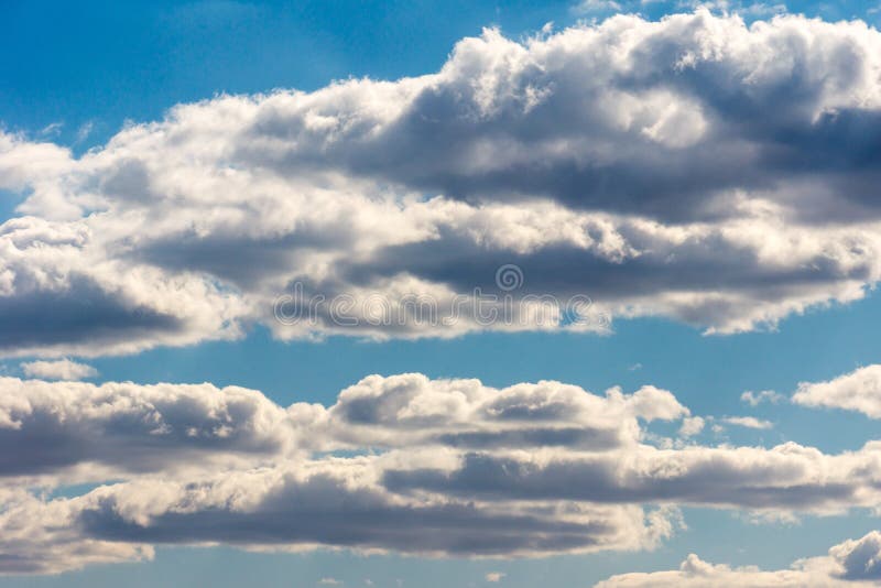 White Clouds Slowly Float Across the Blue Sky. Stock Photo - Image of ...