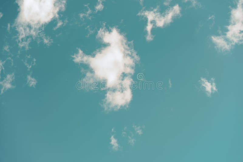White Clouds in a Turquoise Colored Daylight Sky Stock Photo - Image of ...