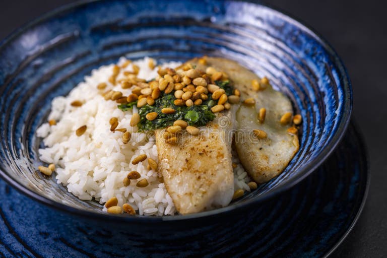 White Cod with Homemade Basil Pesto and Roasted Pine Kernels Stock ...