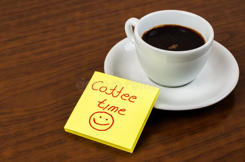 White Coffee Cup and Coffee Beans on a Wooden Table.Coffee Time Stock ...