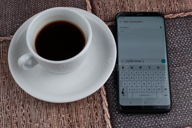 White Coffee Cup with Mobile Phone on Table.Coffee Time Stock Image ...