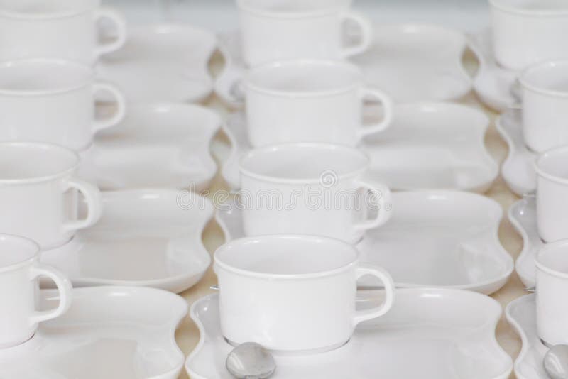 White Coffee Cup Row with Saucer and Spoon on Table Stock Photo - Image ...