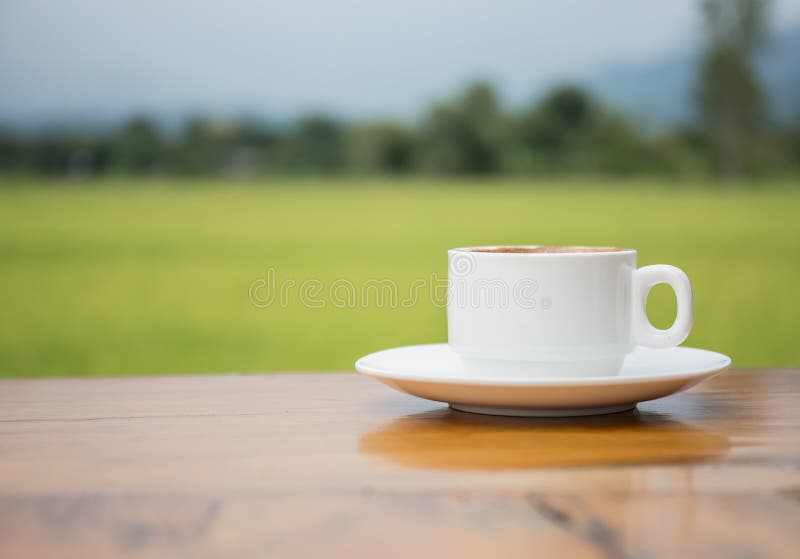A White Coffee Cup on a Wooden Table. Stock Photo - Image of fresh ...