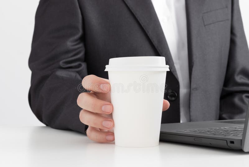 White Coffee Paper Cup Mockup with Man Working on a Computer Stock ...