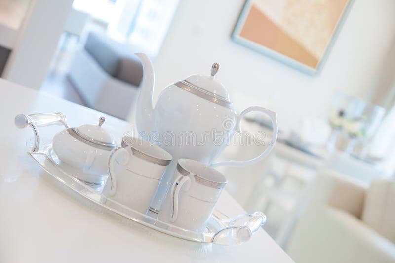 White cups and teapot set stock image. Image of cafe - 16375867