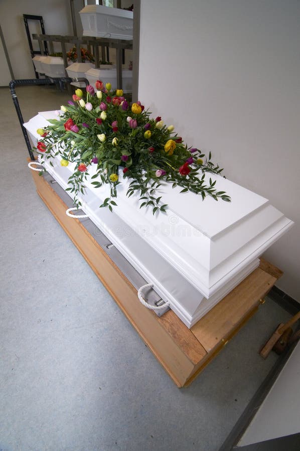 Wooden Coffin With Funeral Flowers In Crematorium Stock Photo - Image ...