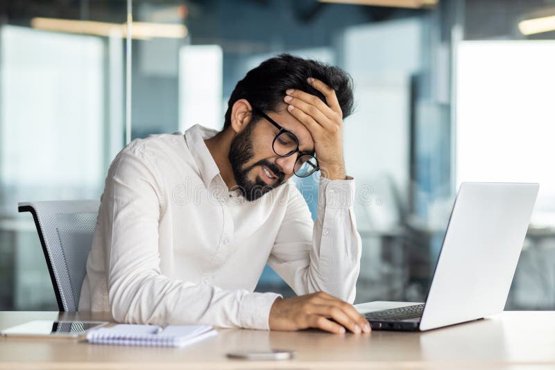 A White-collar Worker at a Desk with a Computer and Office Equipment ...