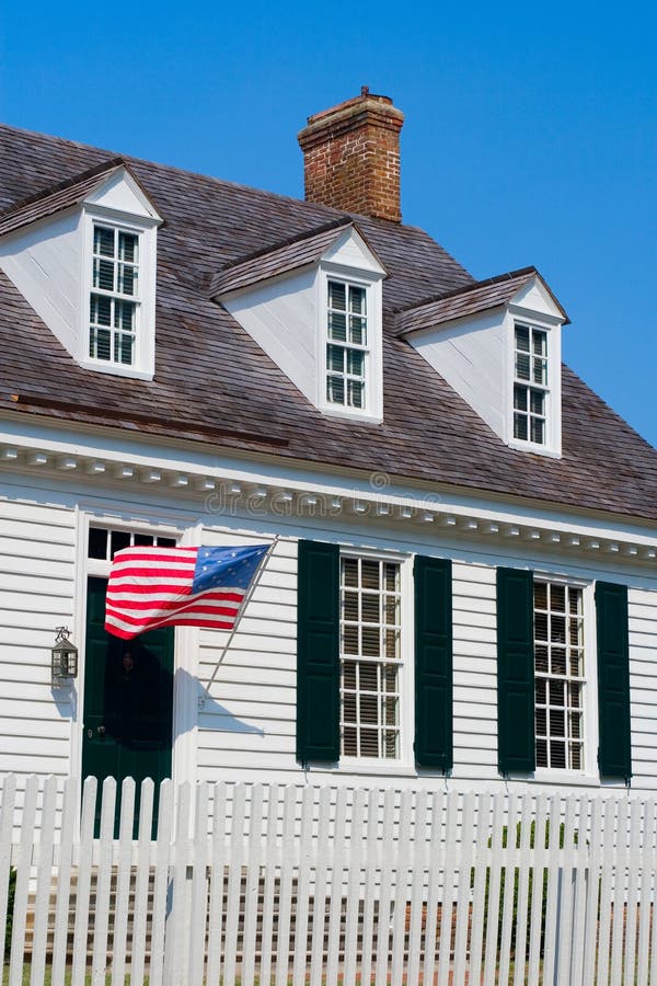 White colonial house side stock image. Image of flag, house - 3583473