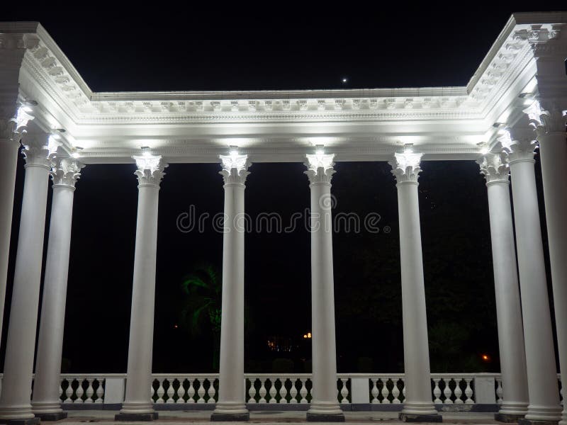 White Colonnade in the Dark. White Columns in the Light of Spotlights ...
