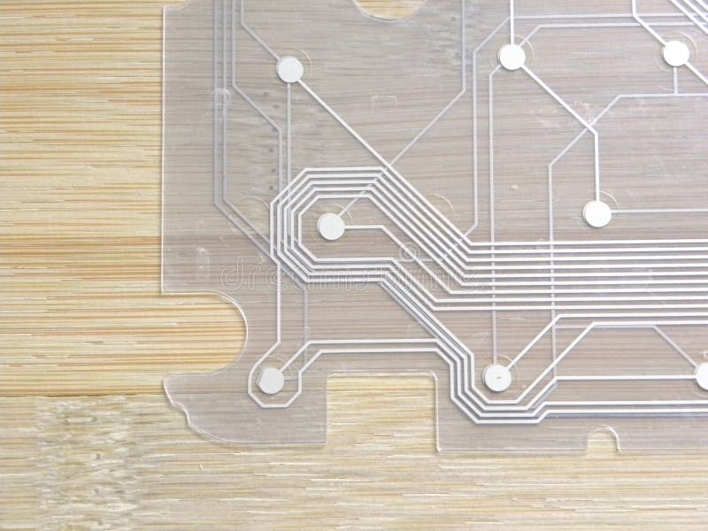 Electronic Flex Circuit Board Detail on Blue Plastic Membrane Curled To ...