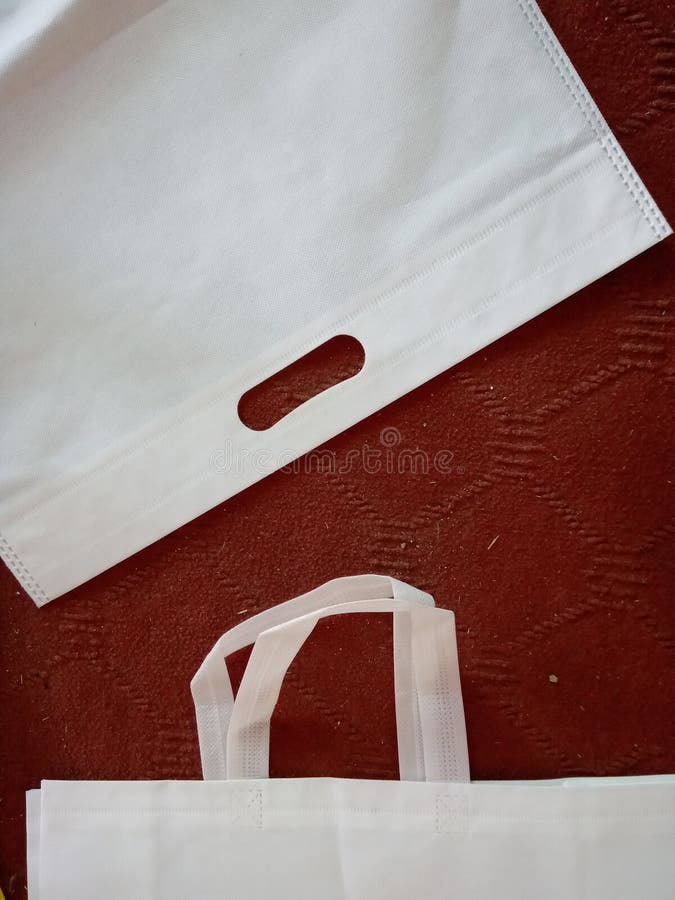 White Color Handle Loop and D Cut Bags Stock Image - Image of white ...