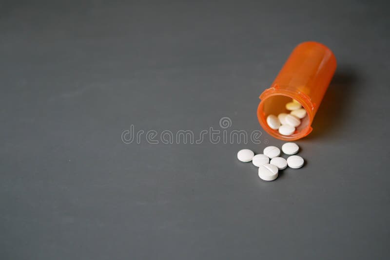 White Color Medical Pills Spilling on Pink Stock Photo - Image of ...