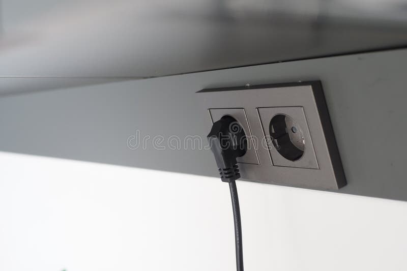 White Color Power Cord Cable Plugged into Wall Stock Image - Image of ...