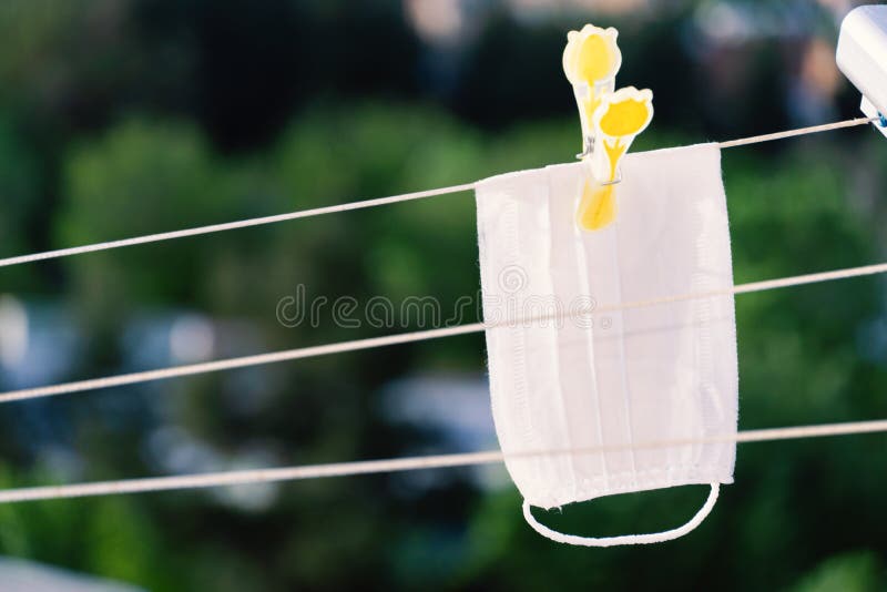 White Color Surgical Mask on Laundry String Stock Image - Image of ...