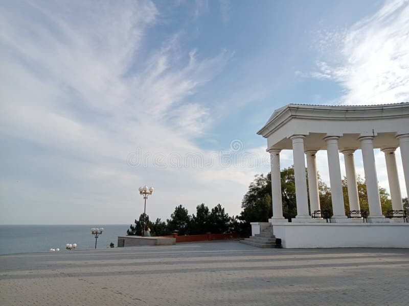 White Columns in the Park and Blue Sky with Clouds Stock Photo - Image ...