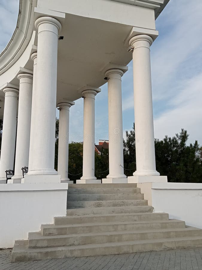 White columns in the park stock photo. Image of column - 259550076
