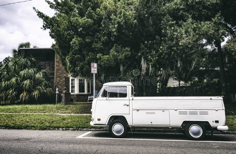 White Compact Van Parked on the Road Near the Trees Editorial Stock ...