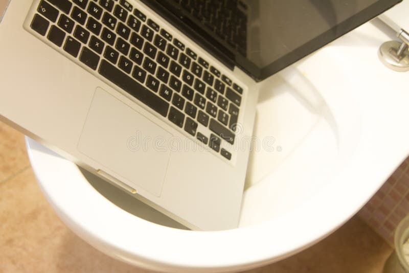 White Computer Keyboard that is Thrown into the Toilet with Water Stock ...