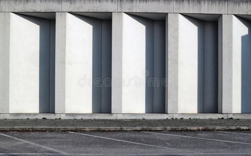 White Concrete Wall with Long Vertical Shadows in the Indentations ...