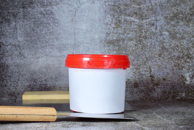 White Container with a Red Cap Mainly To Cover the Walls Stock Photo ...