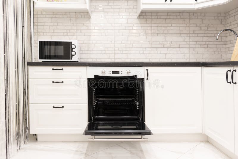 White Contemporary Kitchen with Open Stove Stock Image - Image of house ...