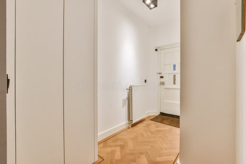 White Corridor with Front Door Stock Image - Image of home, style ...