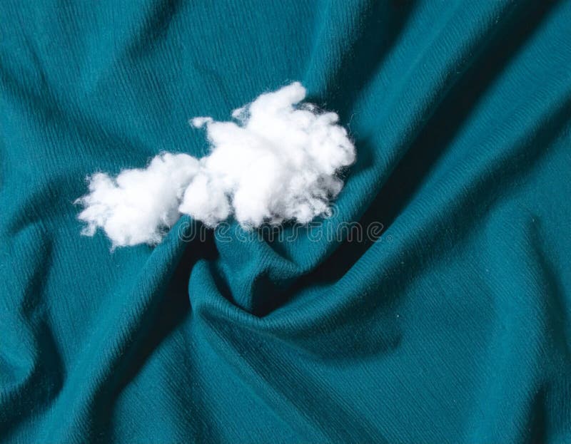 White Cotton Filling on Teal Fabric Stock Illustration - Illustration ...