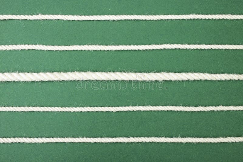 White Cotton Rope Lines on Green Background Stock Photo - Image of hold ...