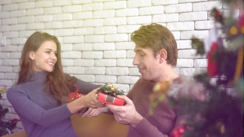 White Couple Exchange Presents for Holiday Season Stock Photo - Image ...