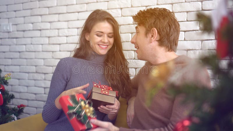 White Couple Exchange Presents for Holiday Season Stock Photo - Image ...