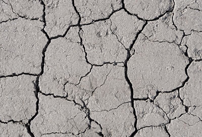 White Cracked Surface of Grey Soil Texture Background, Light Dried and ...