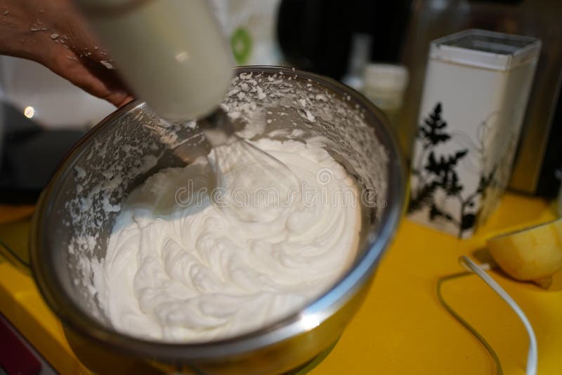 White Cream Being Stirred by a Hand Mixer Stock Photo - Image of metal ...