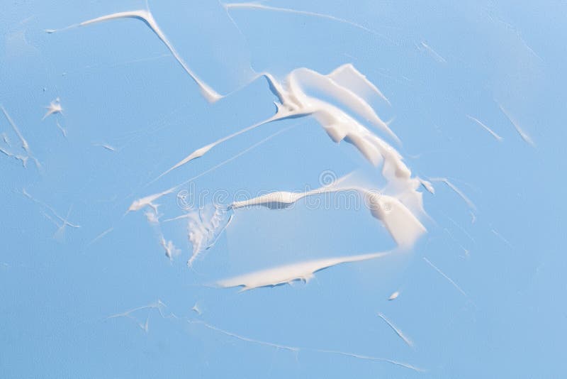 White Cream of Various Shapes on a Blue Background Stock Photo - Image ...