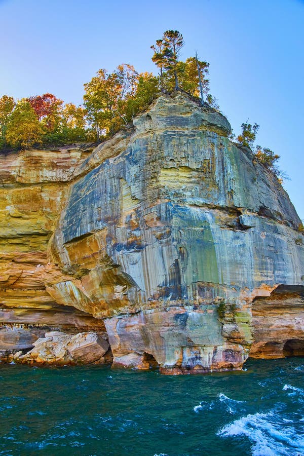 White Cresting Waves in Teal Lake Waters Beneath Pictured Rocks Cliff ...