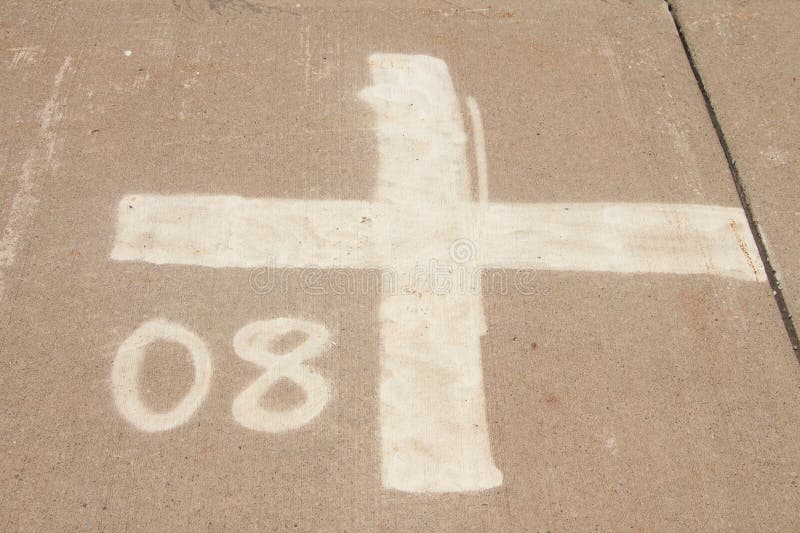 White Cross and Numbers 08 in Bottom Left of Cross Spray Painted on ...