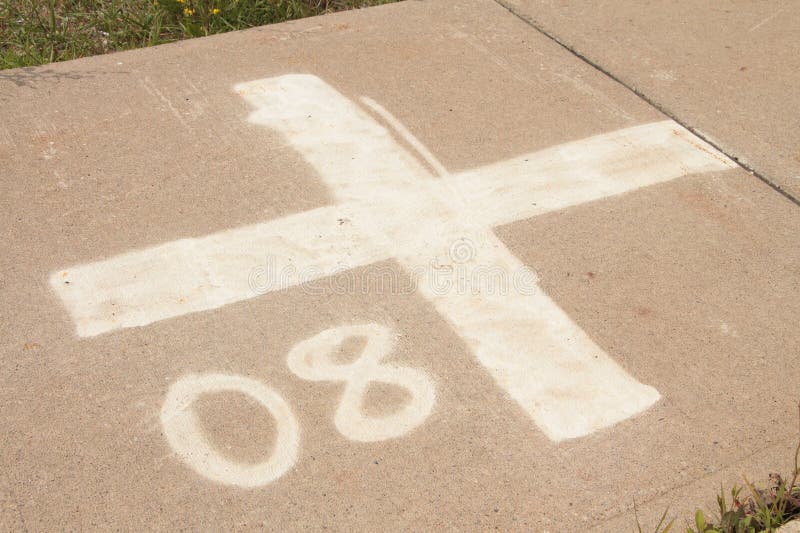 White Cross and Numbers 08 in Bottom Left of Cross Spray Painted on ...