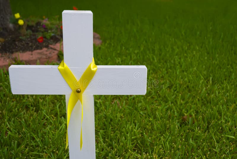 White Cross with Yellow Ribbon Stock Photo - Image of grass, faith ...