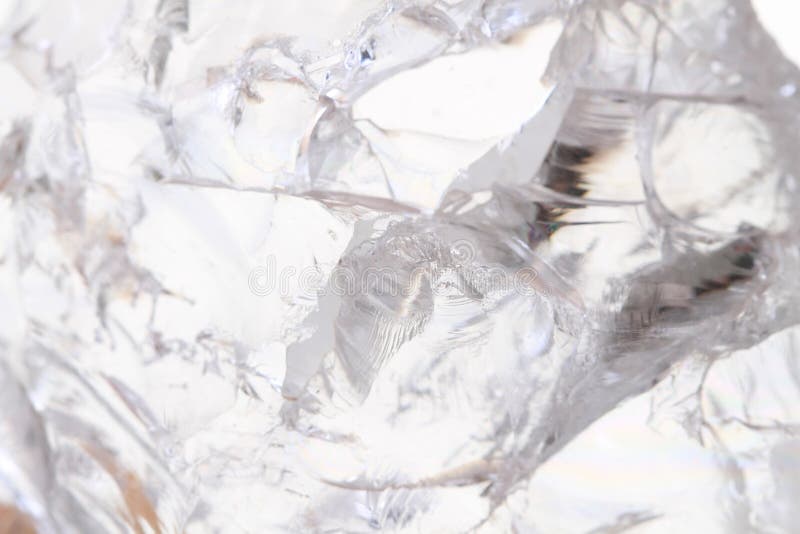 White Crystal Stone on the Sand with Texture. Textured Background ...